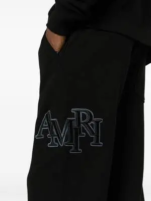 Amiri Staggered Logo-embroidered Track Pants