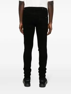 Amiri Logo-patch Ripped Skinny Jeans - Black