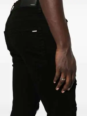 Amiri Logo-patch Ripped Skinny Jeans - Black