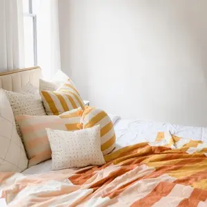 ANCHAL Offset Stripe Quilt Throw Blanket - Rust