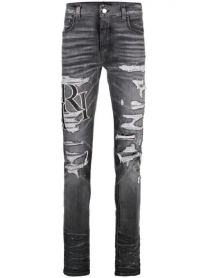 Amiri Staggered Skinny Jeans