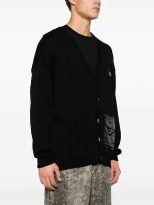 Moschino Embossed Ribbed-knit Cardigan