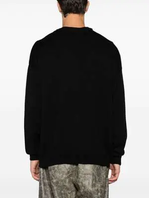 Moschino Embossed Ribbed-knit Cardigan
