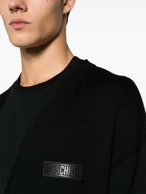 Moschino Embossed Ribbed-knit Cardigan