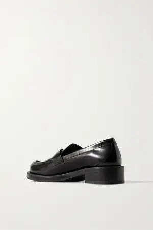 STUART WEITZMAN Palmer Glossed-leather Loafers