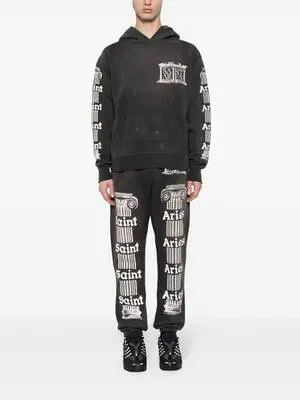 SAINT MXXXXXX Slogan-print Cotton Track Pants