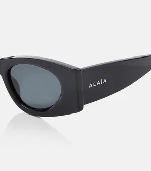 Alaïa Logo Oval Sunglasses - Black