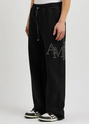Amiri Logo-appliquéd Cotton Sweatpants