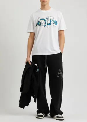Amiri Logo-appliquéd Cotton Sweatpants