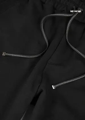 Amiri Logo-appliquéd Cotton Sweatpants