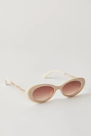 Free People Translucent Pink Slim Oval Sunglasses with Brown Lenses The Best Sunglasses For Oval Face Shapes | TheShadePrjct main image 4