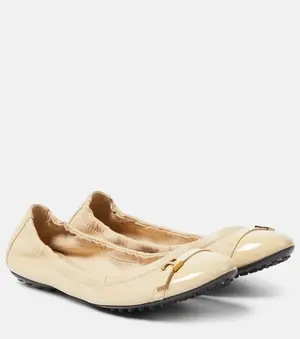 Tod's Gold Tone Flats For Women