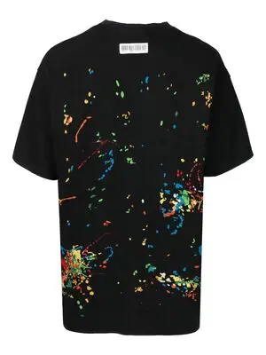 MOSTLY HEARD RARELY SEEN Warped-logo Paint-splatter T-shirt - Black