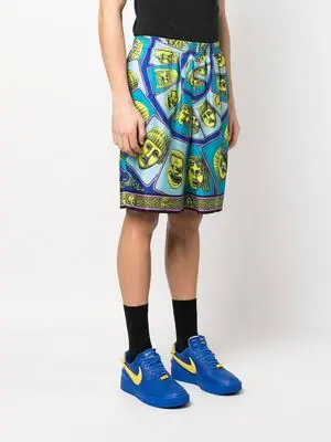 Versace Le Maschere Print Silk Shorts - Blue