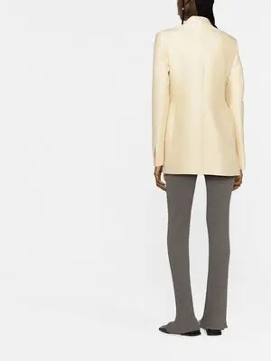 Nanushka Ribbed-knit Flared Trousers