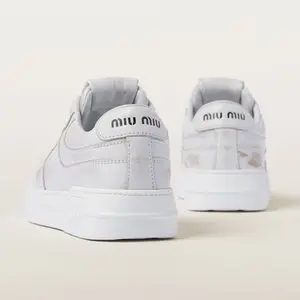 Miu Miu Bleached Leather Sneakers