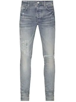 Amiri Distressed Logo Skinny Jeans