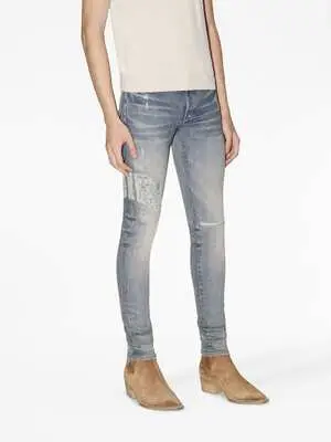Amiri Distressed Logo Skinny Jeans