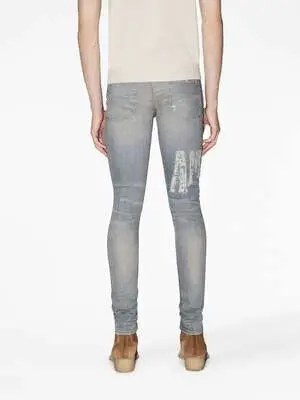 Amiri Distressed Logo Skinny Jeans