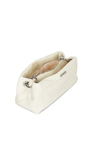 Ganni Pillow Baguette Bag In Cream - Egret | Editorialist