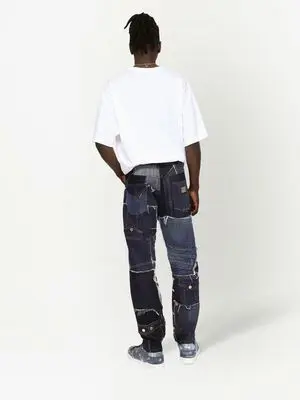 Dolce & Gabbana Patchwork-denim Tapered-leg Jeans