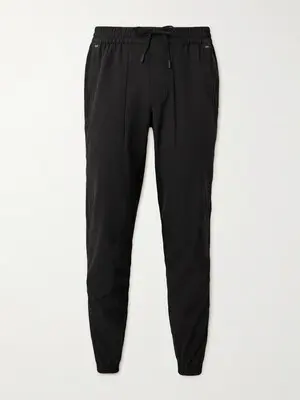 Lululemon License To Train Slim-fit Tapered Stretch Recycled-shell Track Pants - Black