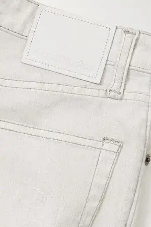 Acne Studios Bow-detailed Flared Jeans