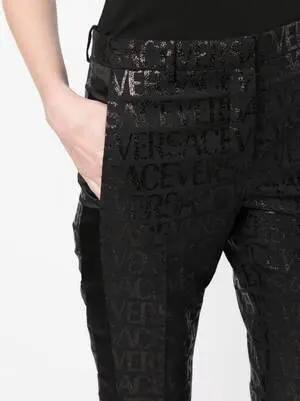 Versace Allover Logo Flared Trousers