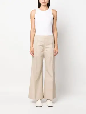 Studio Nicholson Acapulco Flared Trousers - Neutrals