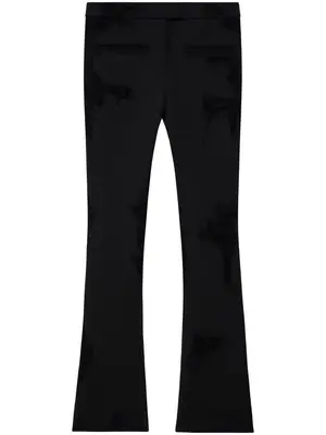 COURREGES Distressed-effect Flared Trousers - Black
