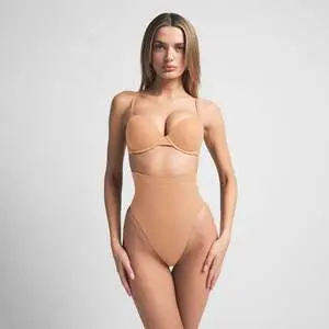 SKIMS Seamless Sculpt Mid Waist Thong Ochre
