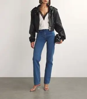 Amina Muaddi Lupita Glass Mules 70