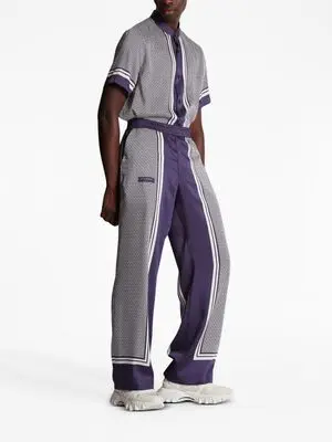 Balmain Vertical-print Straight-leg Trousers