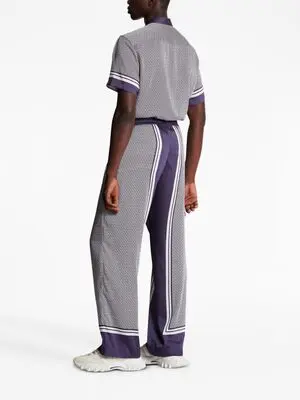 Balmain Vertical-print Straight-leg Trousers