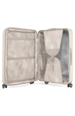 VACAY Future 20-inch Spinner Suitcase