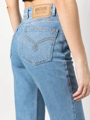 Moschino Raw-cut Mid-rise Flared Jeans