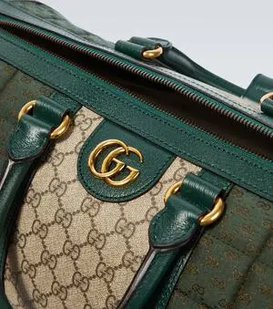 Gucci Mini Gg Small Leather-trimmed Duffel Bag