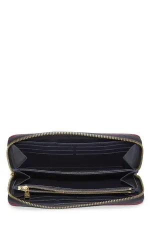 LOUIS VUITTON Bleu Infini Monogram Empreinte Zippy Wallet