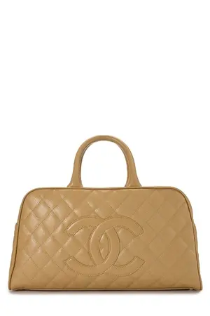 Chanel Gold Tone Travel Bags