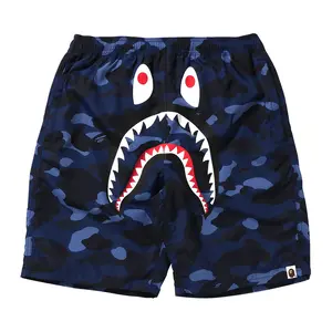 A BATHING APE Color Camo Shark Beach Shorts - Blue