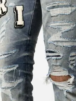 Amiri Varsity Ripped Skinny Jeans