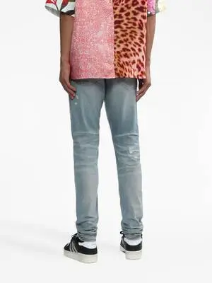 Amiri Logo-print Distressed Jeans