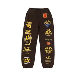 TRAVIS SCOTT X Mcdonald's Sticker Bomb Sweatpants - Brown