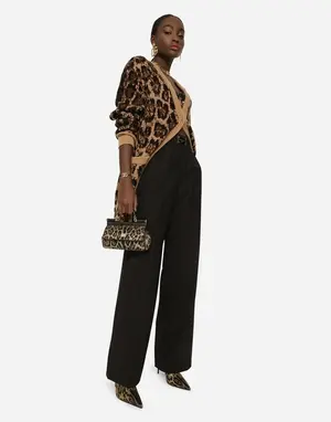 Dolce & Gabbana Flared Wool Pants With Logo Tag