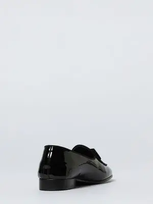 EDHEN MILANO Patent Leather Loafers With Bow Detailing