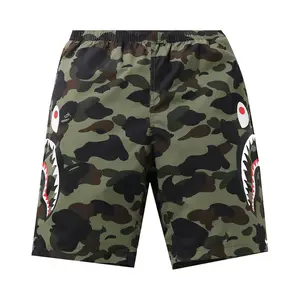 A BATHING APE 1st Camo Shark Beach Shorts - Green