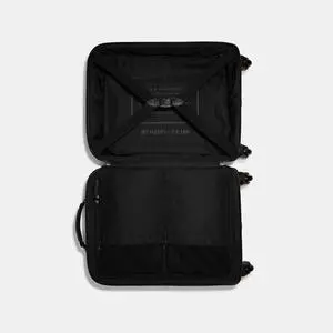 COACH Wheeled Carry On In Signature Canvas