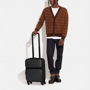 COACH Wheeled Carry On In Signature Canvas