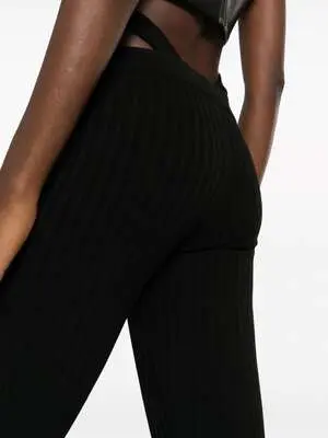 ANDREĀDAMO Ribbed-knit Flared Trousers - Black