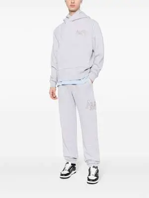 Amiri Staggered Logo-embroidered Track Pants